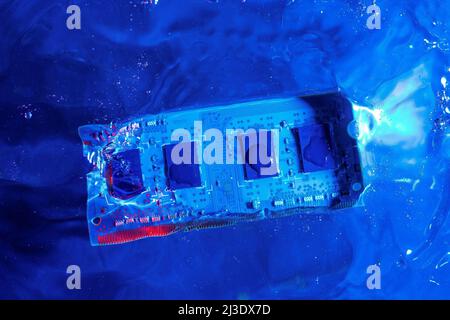 RAM memory from a laptop, ram. Blue and red light, under water ...
