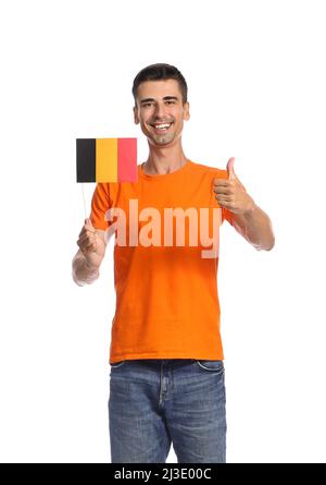 Young man with flag of Belgium showing thumb-up on color background ...