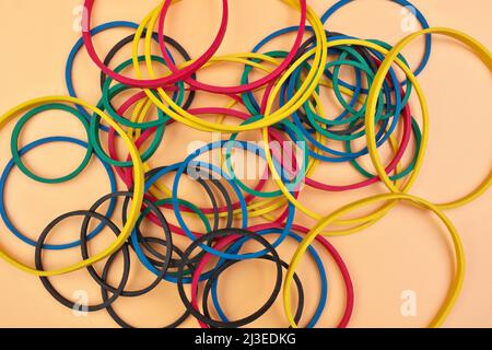 Full Frame Image Flatlay of Multicolored Elastic Rubber Bands on a ...