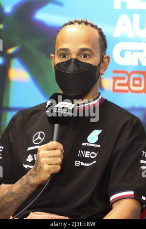 Lewis Hamilton at a press event with McLaren F1 car and Vistajet ...