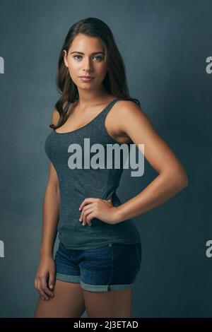 Beyond beauty. Studio shot of a beautiful young woman posing in front ...
