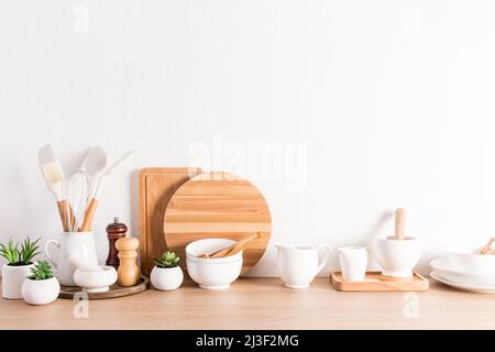 Kitchen utensils on concrete countertop Stock Photo - Alamy