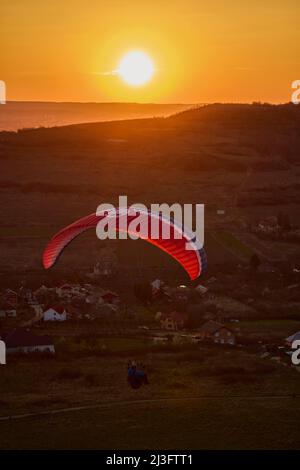 Valeni Arges Romania April 5, 2022: evening training of some skydiving ...