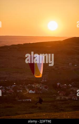 Valeni Arges Romania April 5, 2022: evening training of some skydiving ...