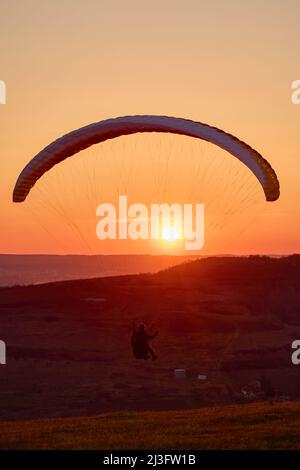 Valeni Arges Romania April 5, 2022: evening training of some skydiving ...
