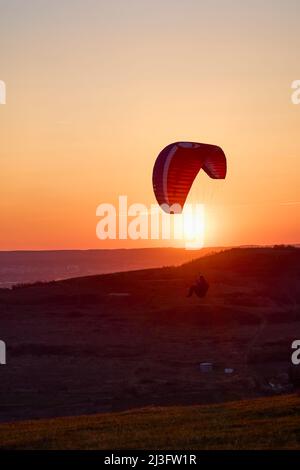 Valeni Arges Romania April 5, 2022: evening training of some skydiving ...
