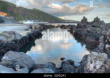 Natural pool at Velas town at Sao Jorge island at the Azores, Portugal ...