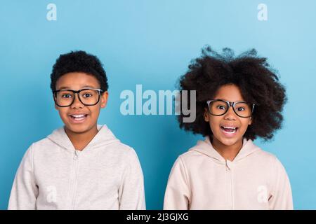 Portrait of attractive cheerful brainy friends friendship creating ...