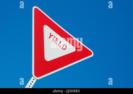 Yield sign for drivers to heed as they move on freeways and highways ...