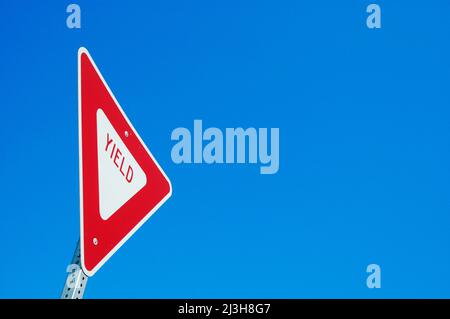 Yield sign for drivers to heed as they move on freeways and highways ...