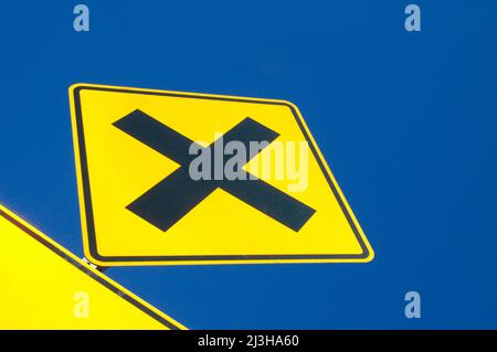 cross roads ahead signs for drivers to see on freeway and roads and ...