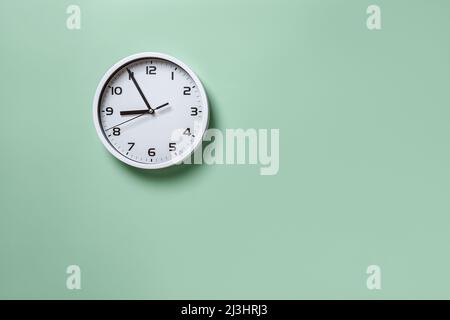 9 to 5. Clock measuring working time. Dial indicates hours spent in job ...