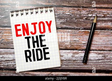 LIFE IS A JOURNEY ENJOY THE RIDE motivational quote. Yellow paint line ...