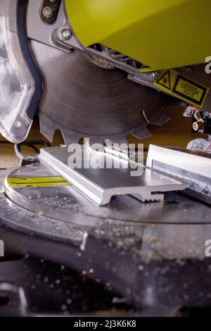 The circular saw cuts the plinth. Tool for repair work Stock Photo - Alamy