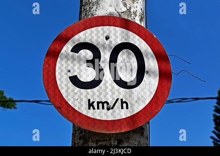 30 kilometers per hour speed limit sign on the street 30 kilometers per ...