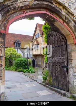 Ancient gate into Winchester Cathedral close near Kings gate ...