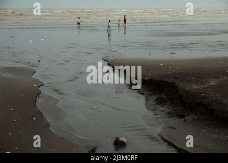 A small stream estuary formed by wastewater from a sewage on Pakis ...