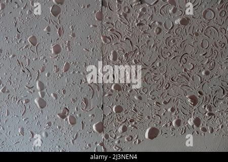 Textured wall lined with shell rock tiles Stock Photo - Alamy