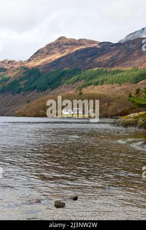 Area of Loch Lomond, Scotland. Picturesque view of a snow covered Ben ...