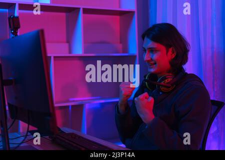 Gamer stream concept, Male streamer feel bored after live streaming of ...