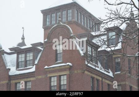 Snowy winter scene from the Harvard University campus in Cambridge ...