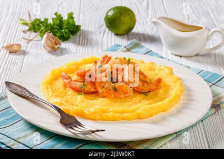 Polenta e schie fritte, venetian dish, polenta with fried shrimps on a ...