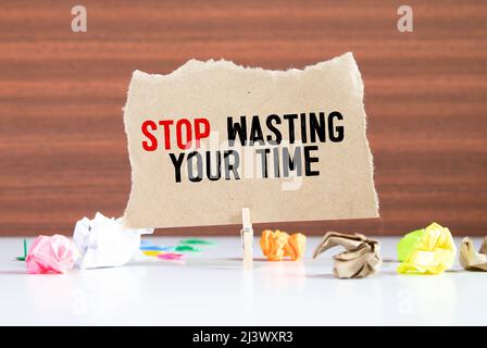 Writing Motivational Text Stop Wasting Your Time Stock Photo - Alamy