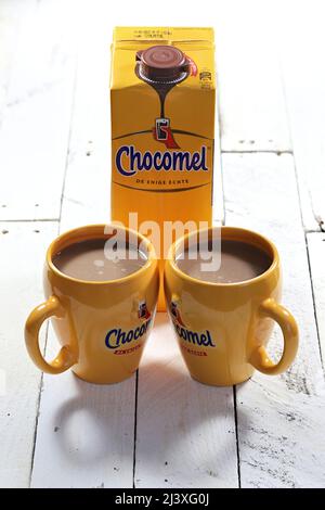 pair of Chocomel mugs with chocolate-flavoured milk isolated on white ...