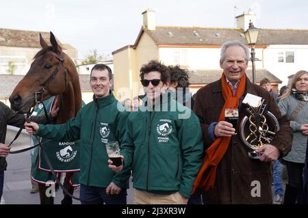 Jockey Sam Waley-Cohen (centre), his father Robert Waley-Cohen (right ...