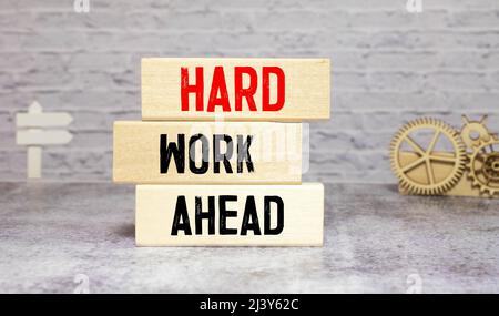 Hard Work Ahead sign, bisiness and job concept Stock Photo - Alamy