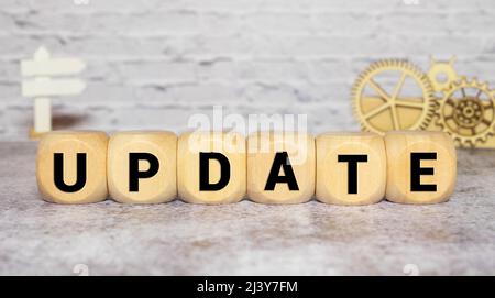 Updates, word in wooden alphabet letters isolated on background Stock ...