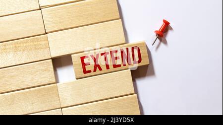 EXTENDED word made with building blocks Stock Photo - Alamy