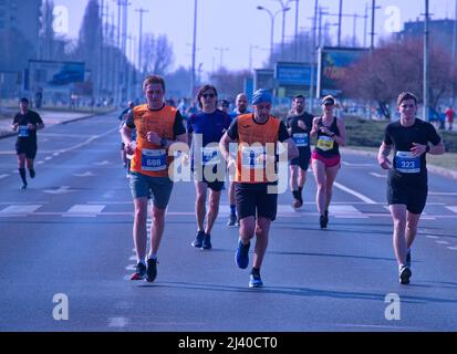 Group of people running Zagreb spring half marathon Stock Photo - Alamy