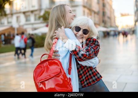 Senior lady spending time at urban area Stock Photo - Alamy