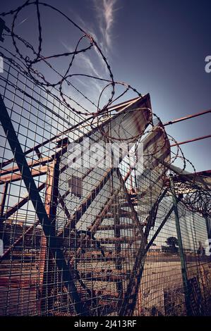 High security fence around compound Stock Photo - Alamy