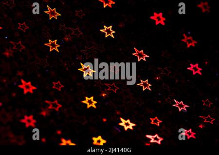 red holographic stars abstract patterned background for design purpose ...