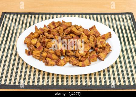 A torrezno is a strip of bacon, always with the skin on, fried or ...