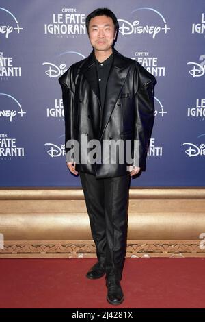 Shi Yang Shi attends at the red carpet of Disney movie Red at The Space ...