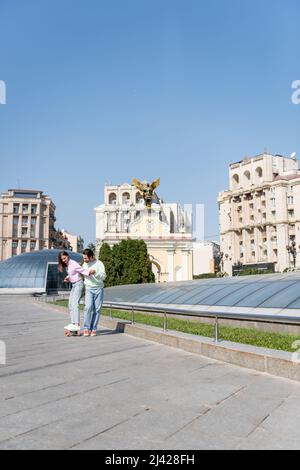 KYIV, UKRAINE - SEPTEMBER 1, 2021: Smiling couple taking selfie on ...