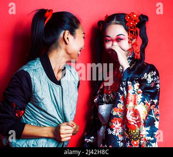 young pretty real geisha in kimono with sakura and decoration on Stock ...