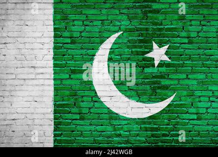 Pakistan national flag painted on textured wall mural background Stock ...