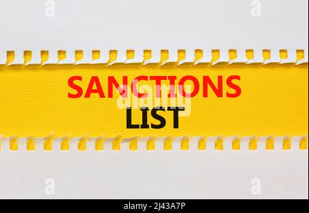 Sanction list symbol. Yellow and white paper with concept words ...