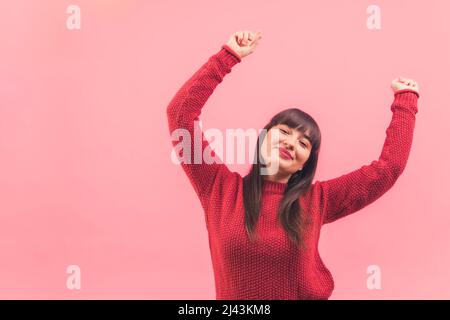 Photo of excited pretty dark skin woman dressed casual pullover holding ...
