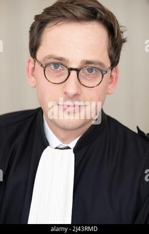 Lawyer Romain Dieudonne poses at her office, on March 21, 2022 in Paris ...