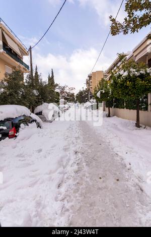 ATHENS, GREECE - January 25 2022: Cars totally covered with snow in ...