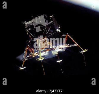 The Lunar Module "Eagle" above the Moon shortly before docking with the ...