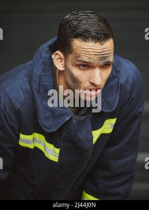 Sexy handsome male fireman working on duty protecting against fire ...