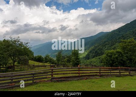 Empty fenced animal field Stock Photo - Alamy