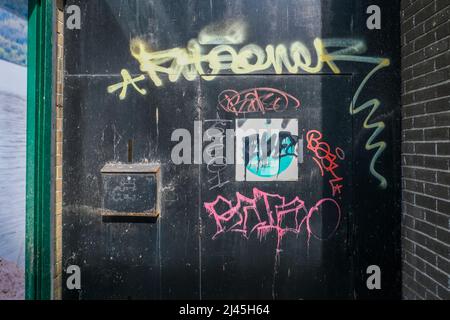 Metal security doors covered in unsightly graffiti and tags in Newquay ...