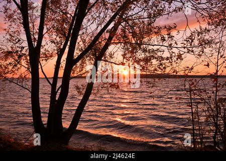 A scenic view of the sunlight visible behind cumulus clouds during ...